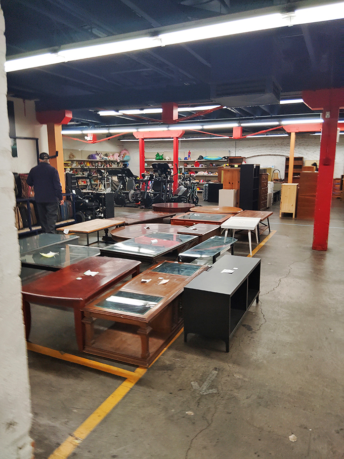 Coffee table central, where glass-topped conversation pieces await their chance to hold your remote controls and takeout containers.