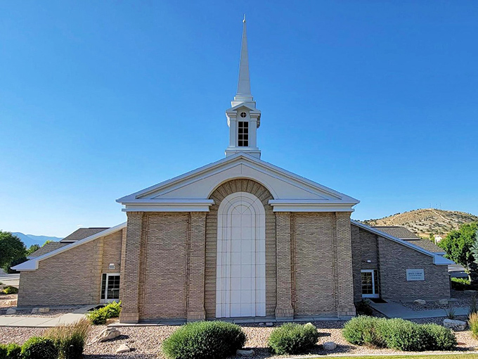 This LDS church combines reverence with architecture, its clean lines and spire creating a modern counterpoint to the historic temple downtown.