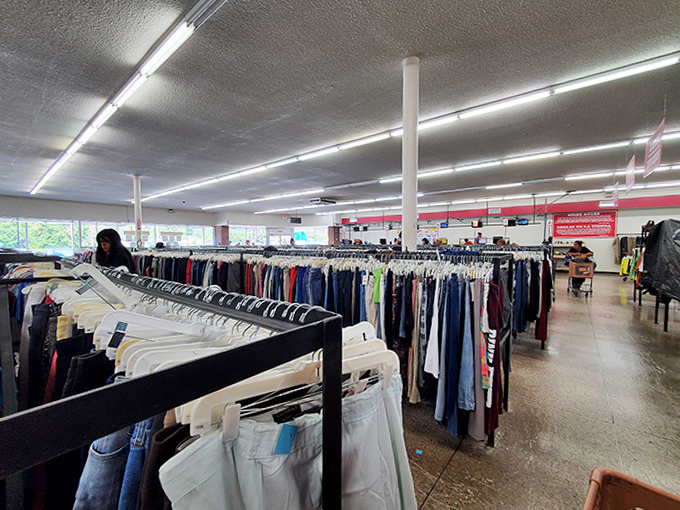 A thrifter's paradise stretches to the horizon, where fluorescent lights illuminate what might be your next favorite outfit.