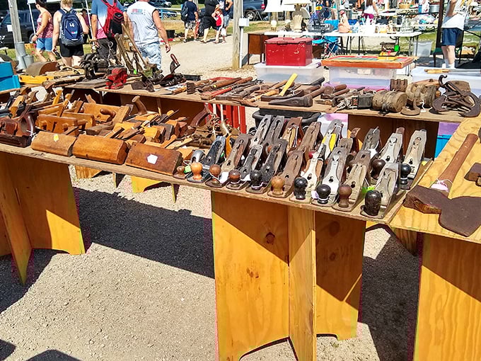 Woodworking tools from another era line the tables, their patina speaking of hands that built homes, furniture, and lives throughout the Midwest.