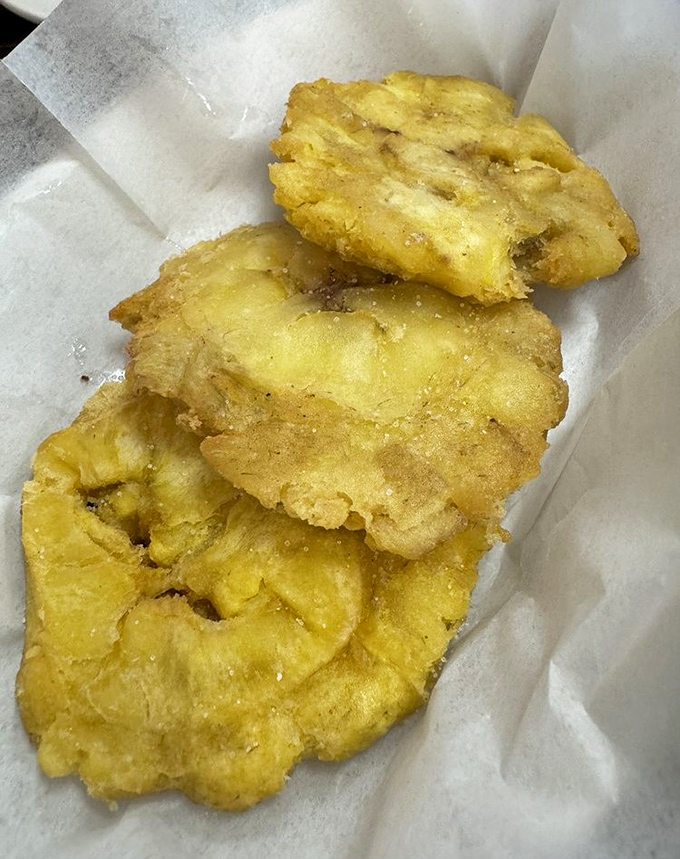 Tostones that crunch like nature's chips&mdash;twice-fried plantain magic that makes you wonder why potatoes get all the glory.