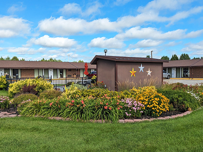 The Trade Winds Motel's garden bursts with prairie flowers, proving that hospitality in Valentine comes with a side of horticultural flair.