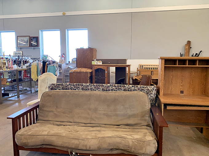 Furniture pieces waiting patiently for second chances, proving one person's "out with the old" is another's jackpot.