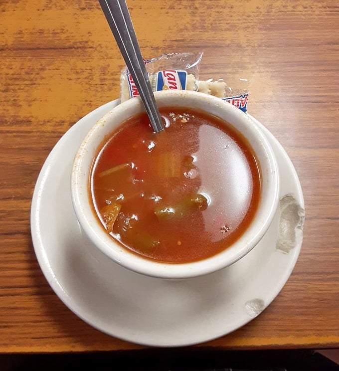 Vegetable soup that tastes like someone's grandmother is in the kitchen, stirring memories into every spoonful.