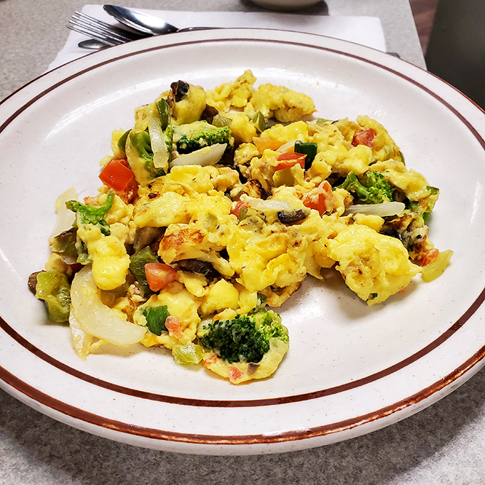 Vegetables for breakfast never looked so appealing. This scramble turns "eating your greens" from chore to celebration. 