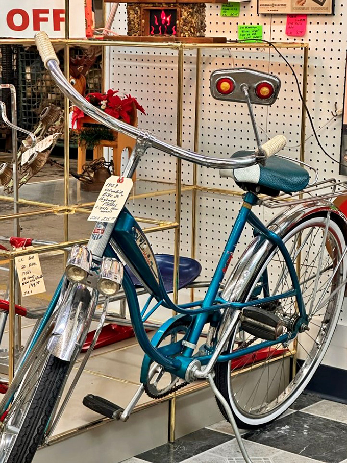 This turquoise beauty once carried someone through neighborhood adventures. Now it carries stories instead of riders.