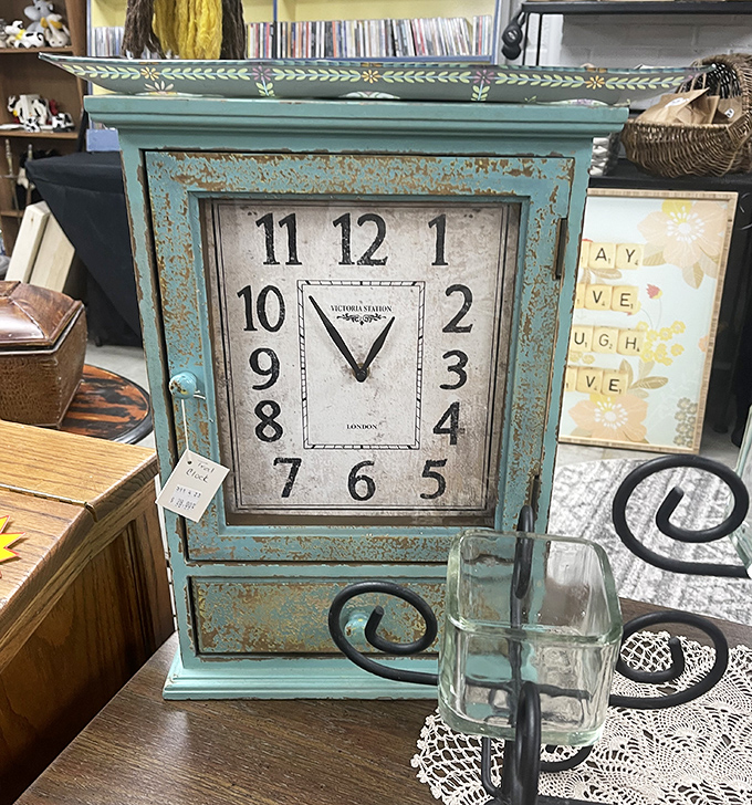 Time stands beautifully still in this distressed turquoise clock. Its intentionally weathered finish tells you it's already survived decades of style changes.