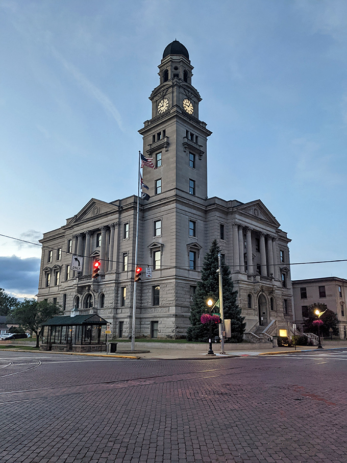 The Washington County Courthouse stands like a dignified elder statesman of architecture, its clock tower keeping watch over downtown since the 1900s.