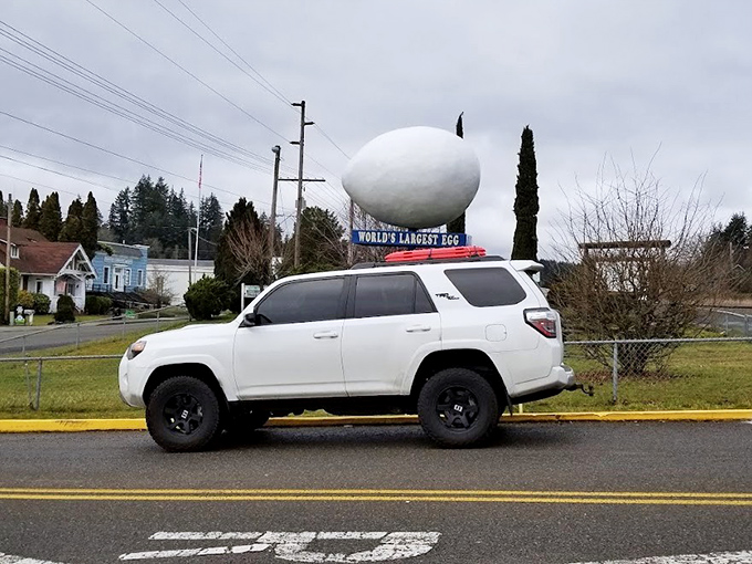 Even passing vehicles seem to slow down in reverence when passing the World's Largest Egg, a roadside attraction worth hitting the brakes for.