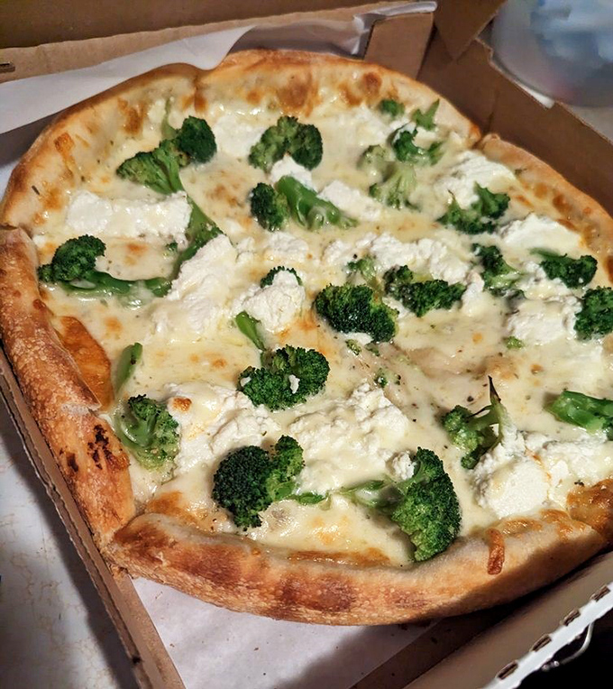 White pizza with broccoli&mdash;where "eating your vegetables" becomes less parental advice and more personal craving.