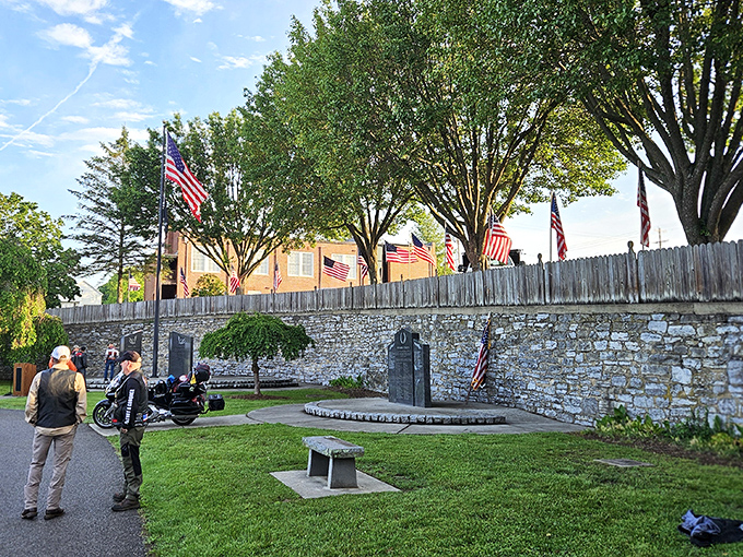Withers Park's memorial honors those who served, creating a peaceful space for reflection amid American flags that flutter like heartbeats in the breeze.