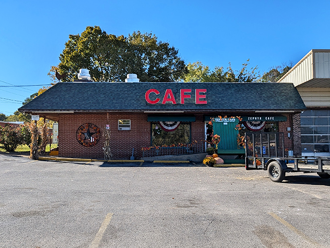 The Zephyr Cafe's neon sign promises what every traveler seeks: good food, friendly faces, and coffee strong enough to resurrect the dead.