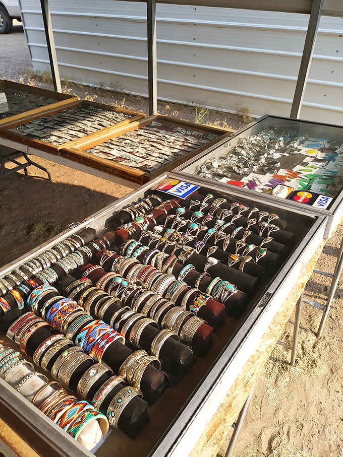 A jewelry display that would make Elizabeth Taylor pause—bracelets stacked like the geological layers of nearby mesas.