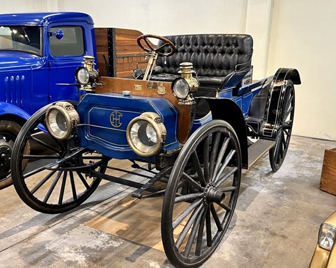 This gleaming blue horseless carriage represents that magical moment when humans decided horses had enjoyed their transportation monopoly long enough.