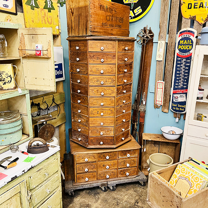 This apothecary cabinet once organized someone's hardware dreams. Now it awaits a new home where its many drawers can hide modern secrets.