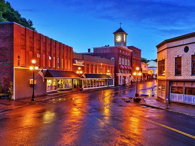 Main Street after rain creates the kind of glow Instagram filters try desperately to replicate. Small-town magic that no algorithm can capture.