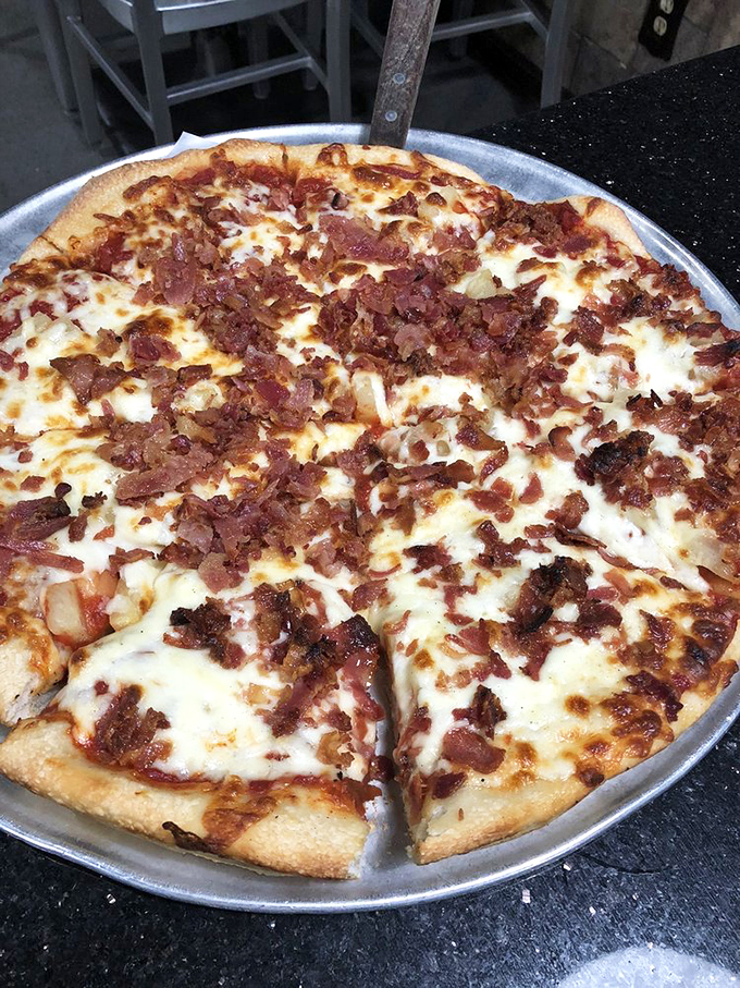 Bacon doesn't just improve this pizza&mdash;it transforms it into a crispy, savory masterpiece that would make even vegetarians pause for reflection.