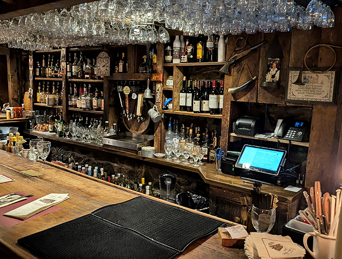 The tavern's bar doesn't just serve drinks—it serves history with a splash of atmosphere and a generous pour of authenticity.