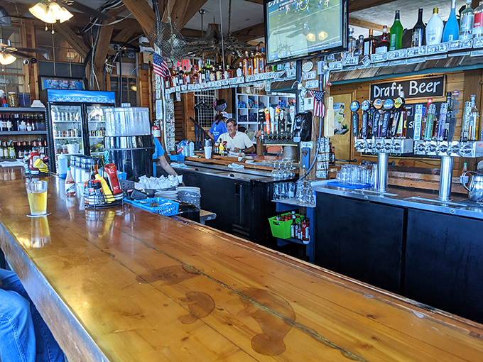 The bar where strangers become friends and friends become regulars. That wooden countertop has heard some stories.