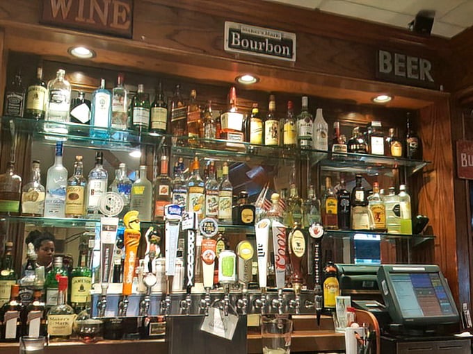 A bar stocked for serious business. Where bourbon meets beer meets wine in a display that says, "Your day just got significantly better."