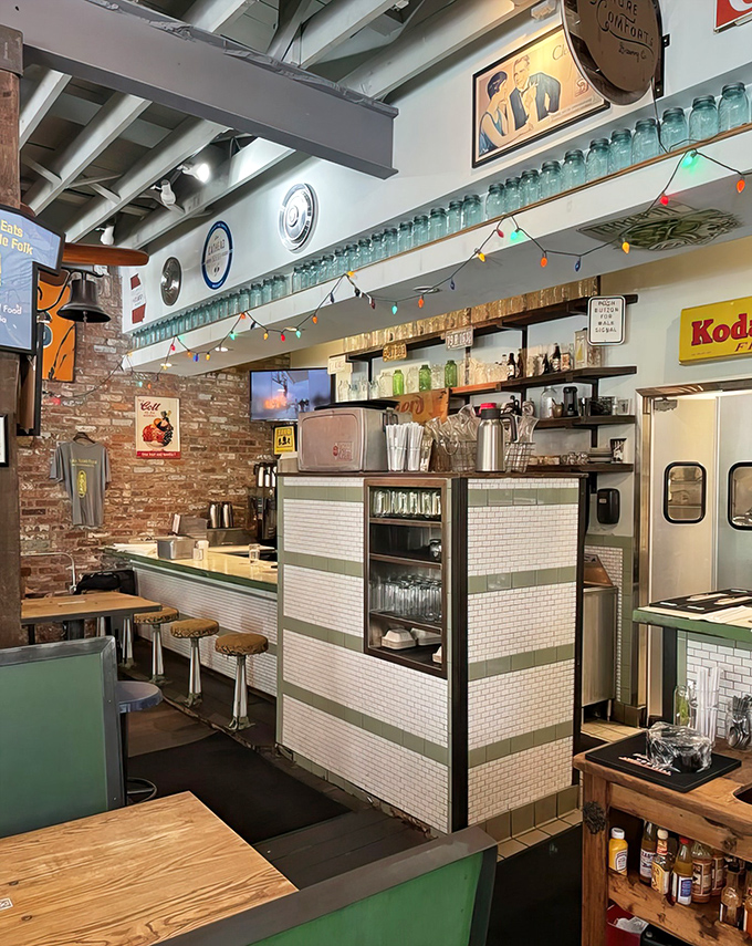 The bar area collects nostalgia like some people collect stamps&mdash;Kodak signs, vintage stools, and character everywhere you look.