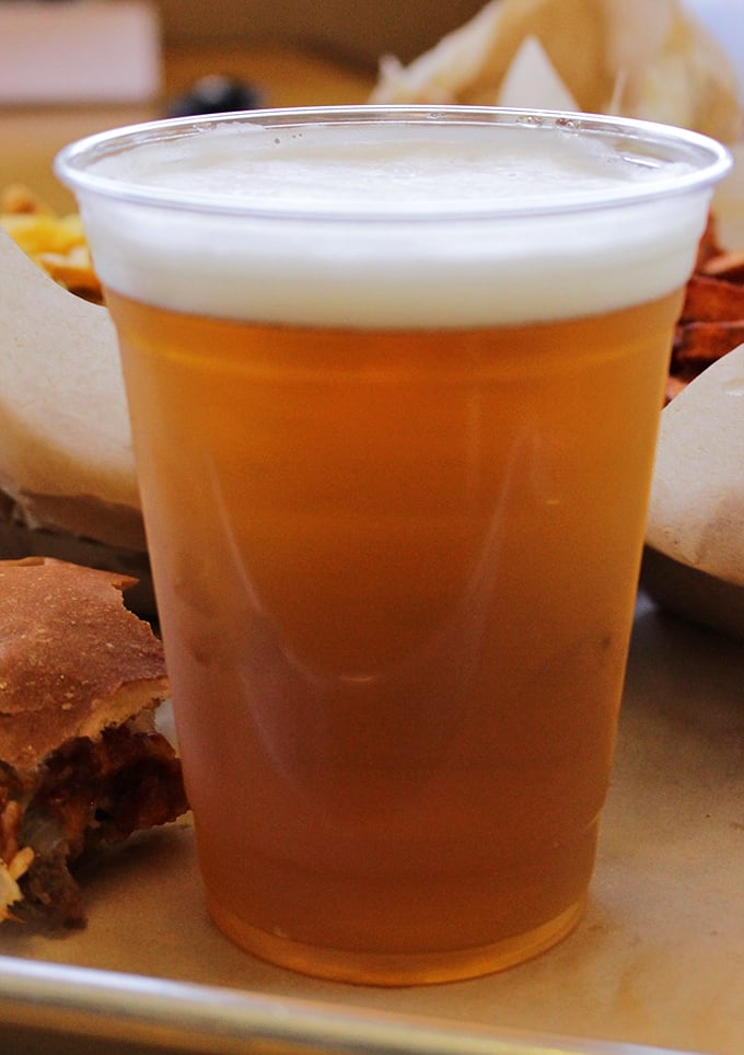 Cold beer: nature's perfect companion to a burger feast. Simple pleasures are often the most profound, especially after noon.