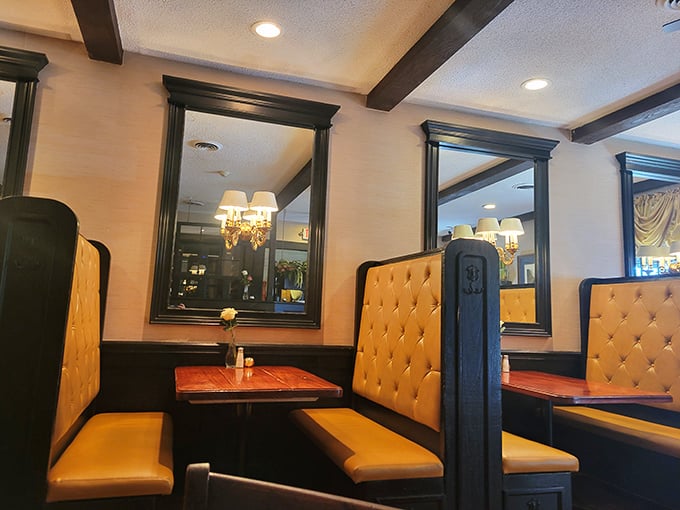 Cozy booths that invite intimate conversations and lingering meals, where the world outside disappears for a few delicious hours.