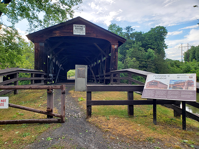 The informational display stands guard at the entrance, a ma&icirc;tre d' introducing you to the historical experience ahead.