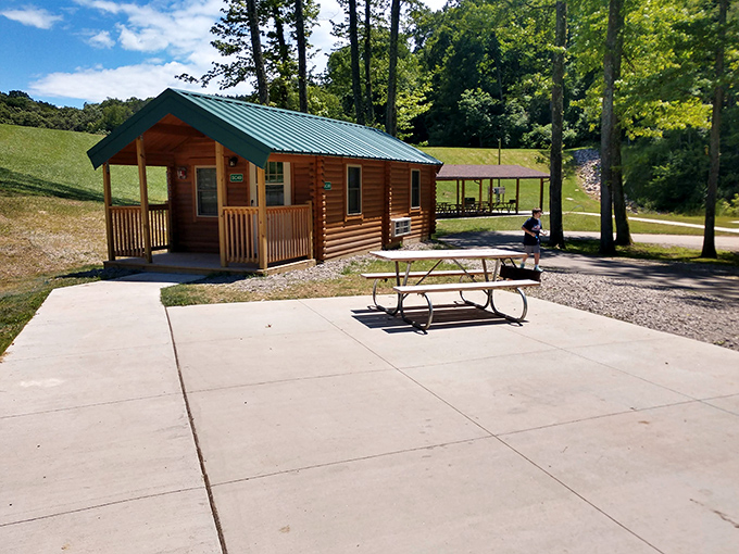 Cabin in the woods without the horror movie plot &ndash; just pure comfort with a porch that practically demands morning coffee contemplation.