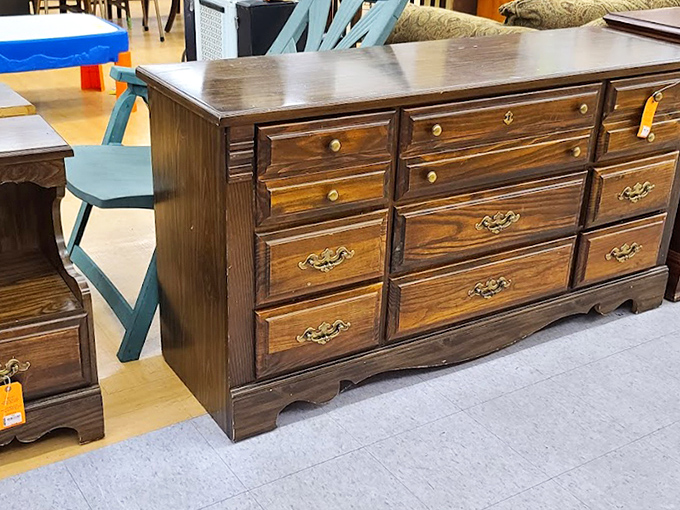 Solid wood furniture with stories to tell. This dresser probably witnessed decades of morning routines before landing in thrift store limbo.