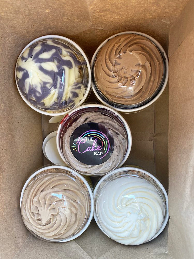 A box of possibilities &ndash; each swirl of frosting promising a different journey into buttercream bliss.