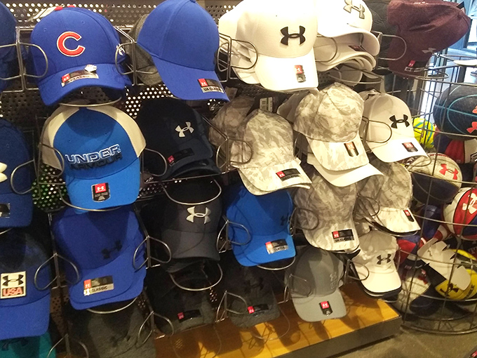 The hat wall: where sports loyalties are displayed, sun protection is secured, and bad hair days are banished in one fell swoop.