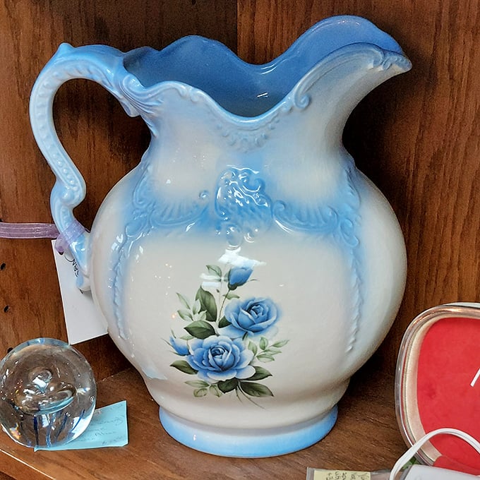 This blue-trimmed ceramic pitcher with hand-painted roses isn't just kitchenware&mdash;it's grandmother's Sunday dinner, childhood summers, and simpler times all poured into one vessel.