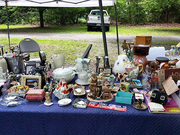 "Stop! Listen to The Osmonds!" commands a vintage sign among porcelain figurines and teacups waiting for their second act.