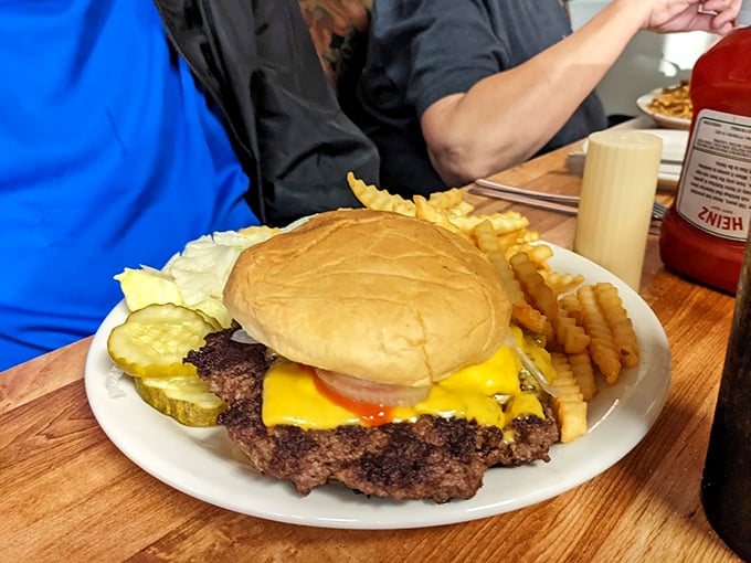A cheeseburger that doesn't need fancy toppings to impress &ndash; just honest beef, melted cheese, and the promise of napkin-required satisfaction.