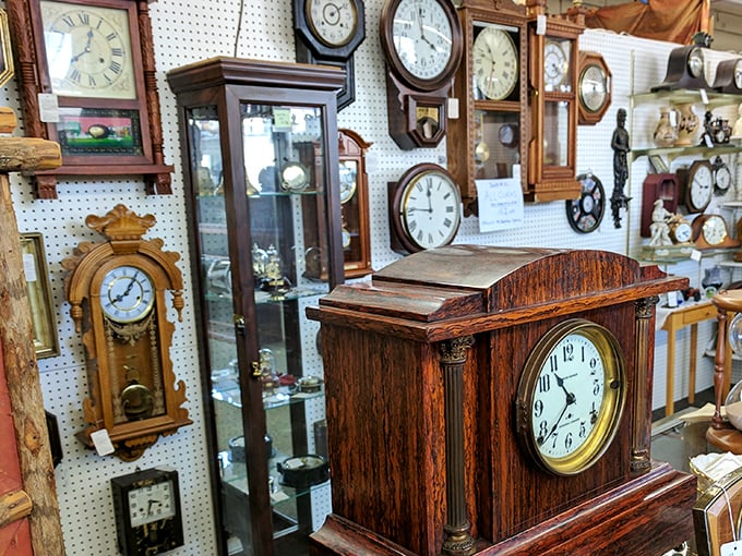 A wall where time literally stands still&mdash;dozens of clocks frozen at different moments, like a physical manifestation of Einstein's theory of relativity.
