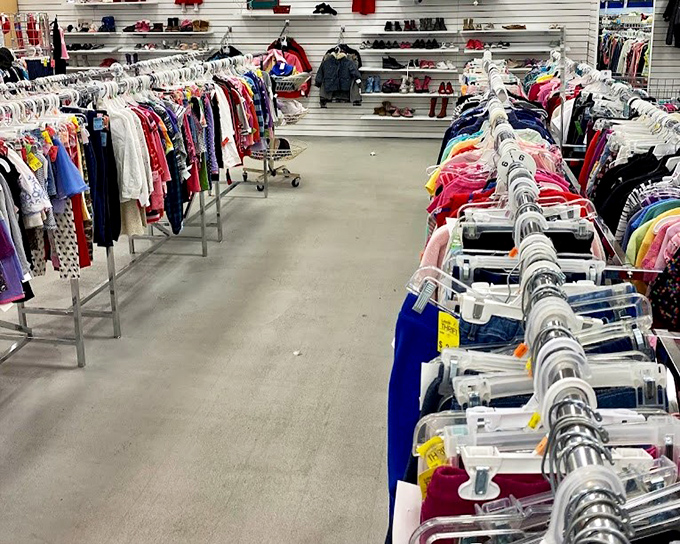 Children's clothing arranged with military precision&mdash;a rainbow of tiny fashions waiting for the next generation of style icons and playground trendsetters.