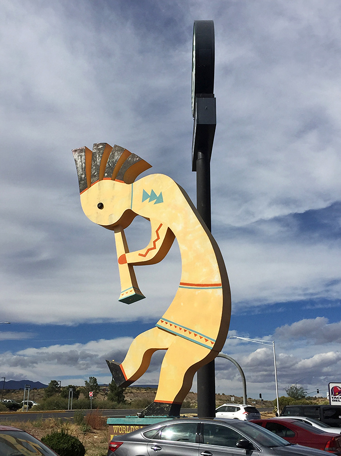 Even under moody skies, this dancing figure maintains its eternal optimism, forever mid-jig against Arizona's dramatic landscape.