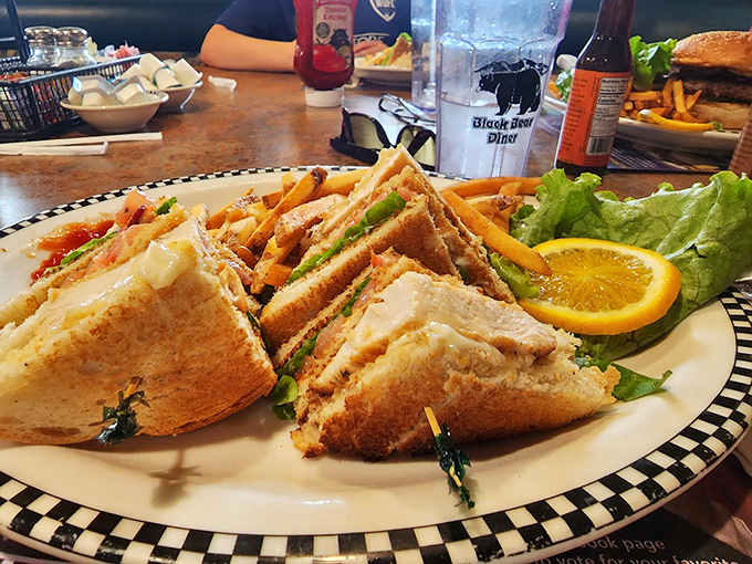 A sandwich architecture that defies physics yet somehow holds together until the last bite. That's engineering you can eat.