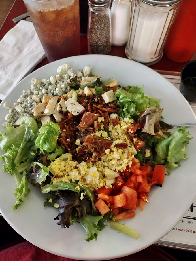 A salad that doesn't apologize for being healthy while still hanging out with bacon and blue cheese. It's having its cake and eating it too.