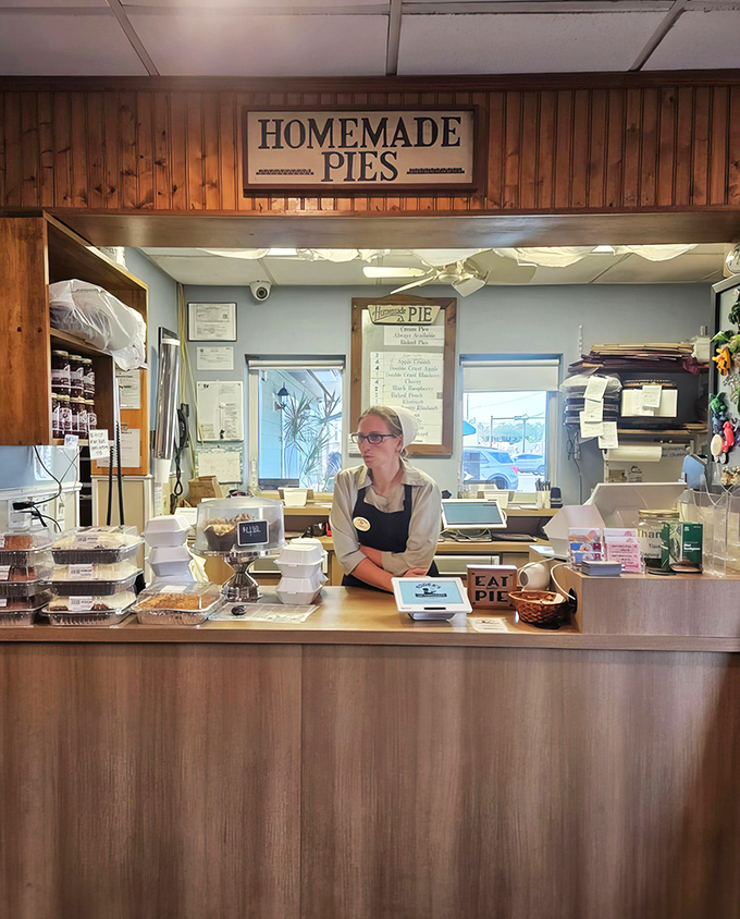 Behind this counter, pie magic happens daily. The sign doesn't lie—these aren't just homemade pies, they're home-run pies.