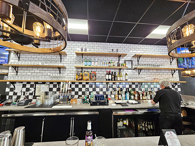 The bar area isn't just serving drinks&mdash;it's serving possibilities. That white subway tile backdrop is practically begging for your social media closeup.