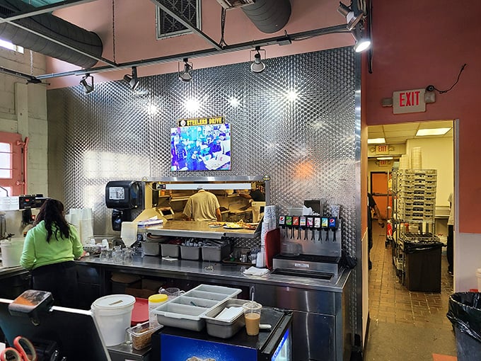 Behind the scenes where breakfast dreams come true. That stainless steel backdrop isn't just a kitchen &ndash; it's a stage for morning magic.