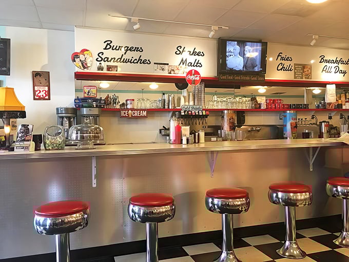 Chrome stools that gleam like jewelry and a counter that's witnessed decades of coffee refills and life stories.