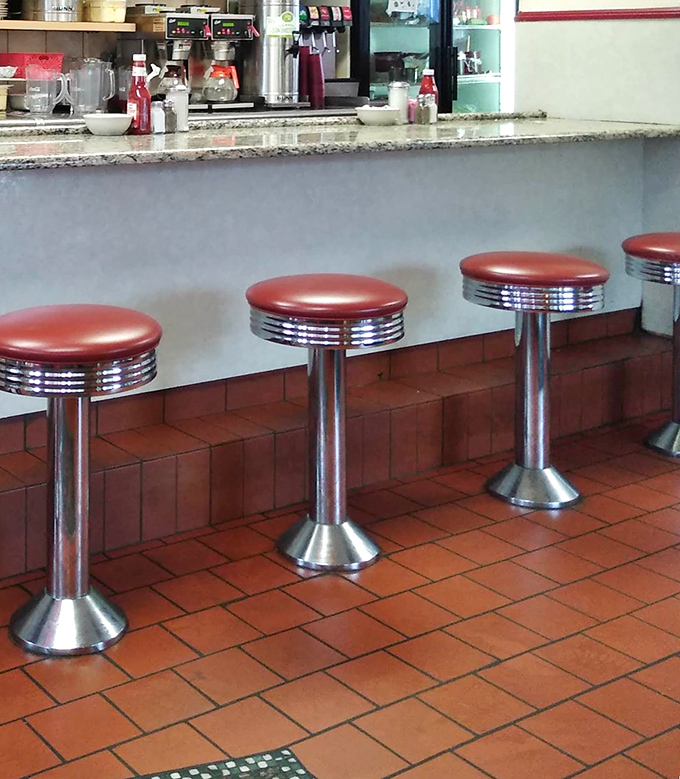 Counter seating: where solo diners become temporary neighbors and the short-order ballet unfolds before your eyes like delicious performance art.