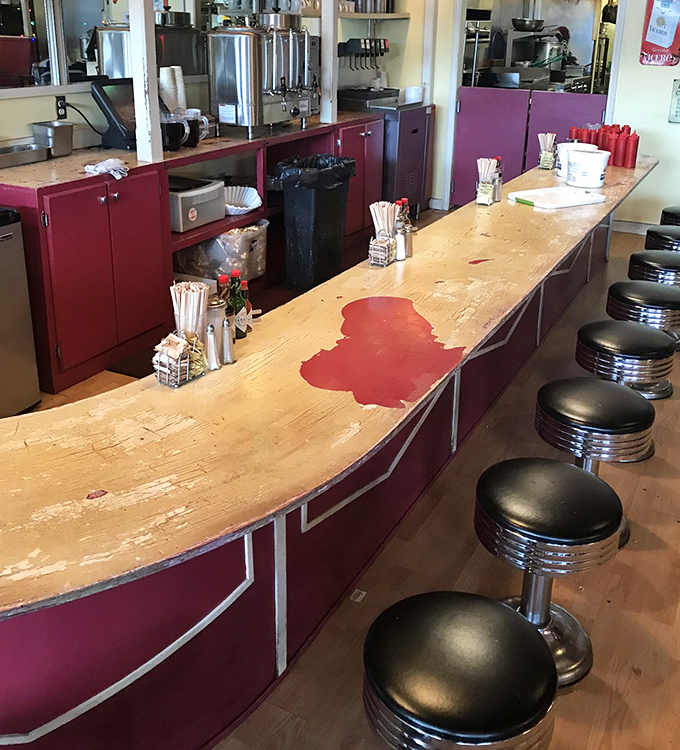 The counter seating&mdash;where breakfast veterans perch to watch culinary magic happen and single diners never feel alone in their waffle worship.