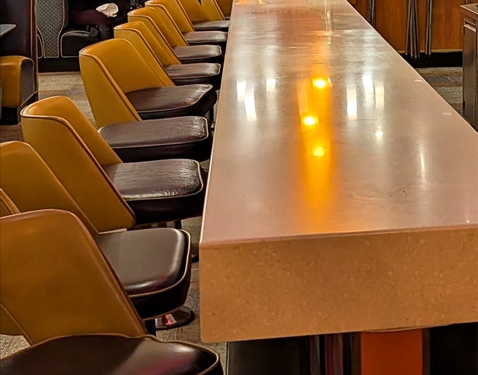 Counter seating that invites solo diners to enjoy a meal without the awkwardness of an empty chair silently judging your dessert order.
