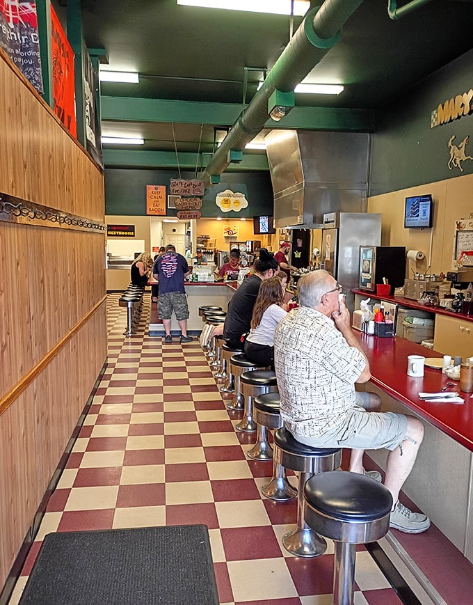 The counter&mdash;where solo diners find community, regulars claim their territory, and everyone gets a front-row view of breakfast theater.