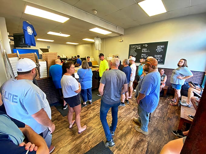 The ultimate community gathering spot where strangers become friends while waiting for their pizza&mdash;shared anticipation creates the best appetizer.