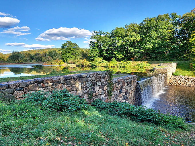 Not just any dam—a masterpiece of stone that turns rushing water into a soothing soundtrack for your nature escape.